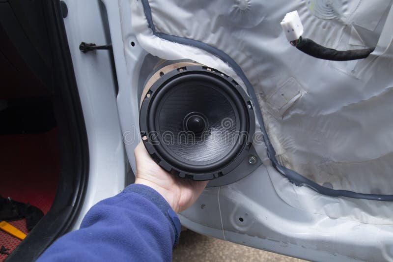 Car Audio System.Installation of Acoustics in the Front Doors of the ...