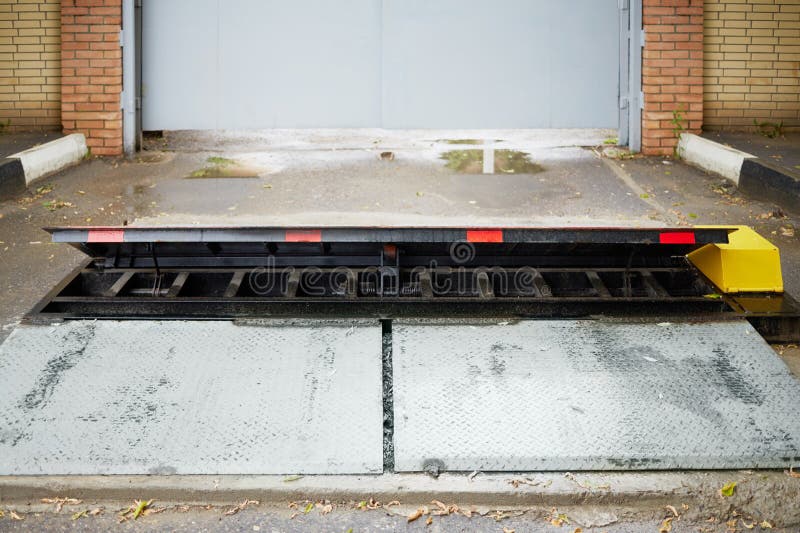 Car Barrier (roadblock) in Front of Metal Stock Image - Image of ...