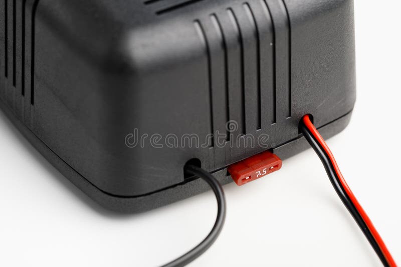 Car battery charger fuse stock photo. Image of negative - 132887764