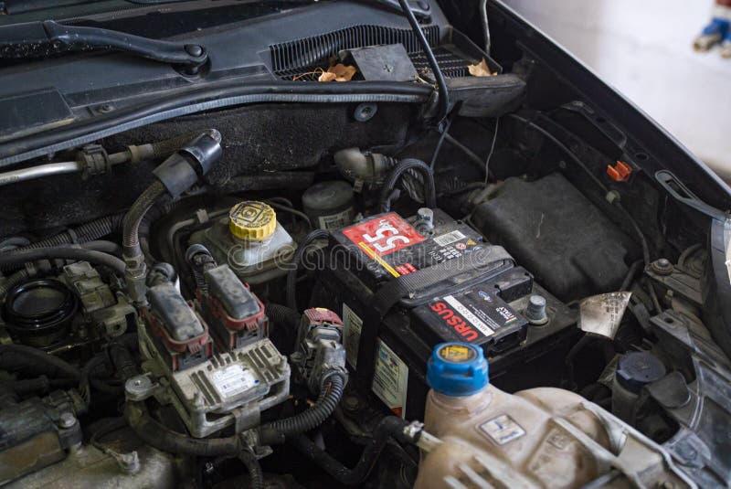 The Battery in the Car in the Engine Compartment, Background ...