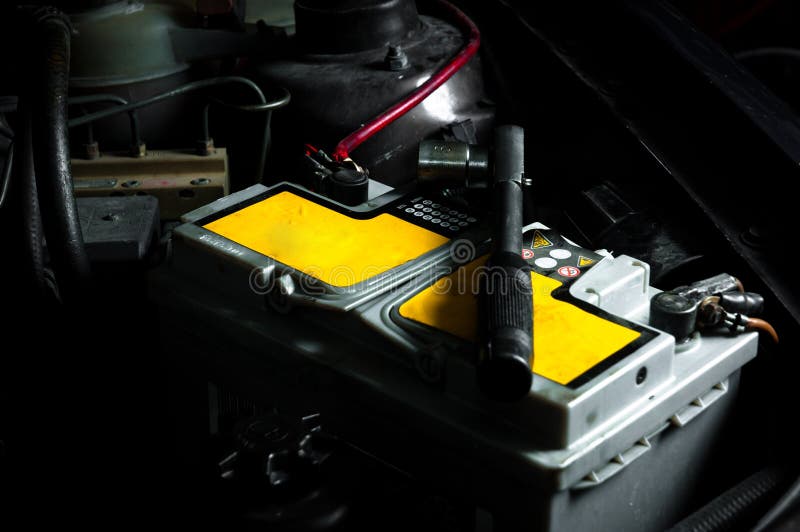 Car battery inside the car stock photo. Image of power - 21490106