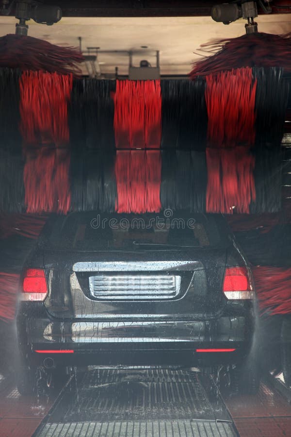 Car Being Cleaned in a Car Wash Unit Stock Photo - Image of automated ...