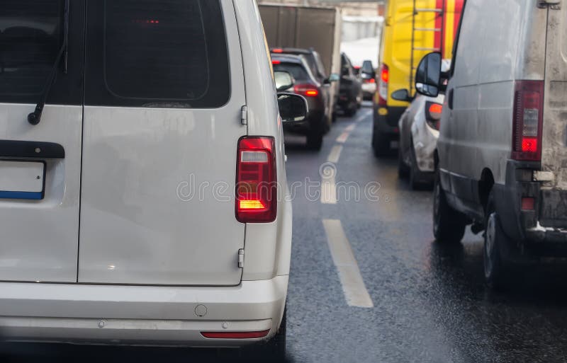 Car in a Big Traffic Jam. Back View Stock Photo - Image of slow, street ...