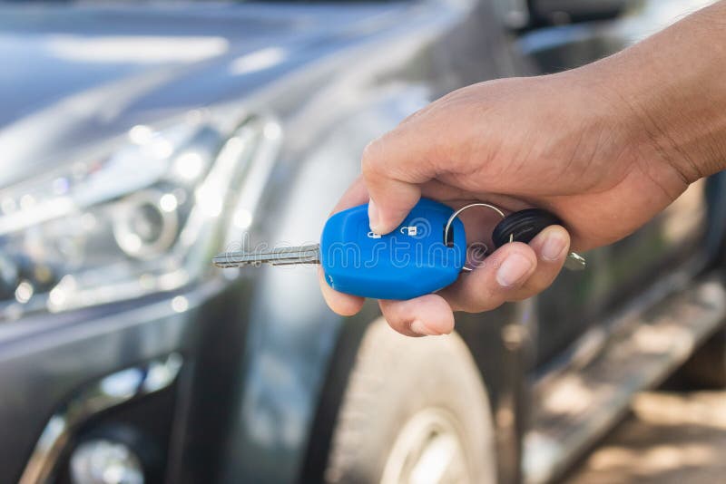 Car blue keys in hand stock photo. Image of blue, vehicle - 127582336