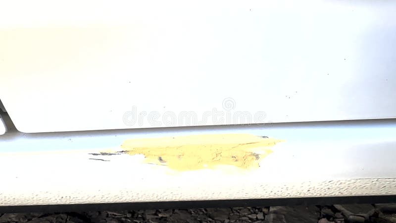 Car Bodywork in Progress with Filler Applied Over Damage Part. Prepare ...