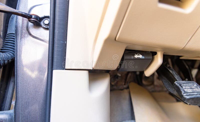 Car Bonnet Release Lever, Car Interior. Hand Pulling Car Bonnet Release ...