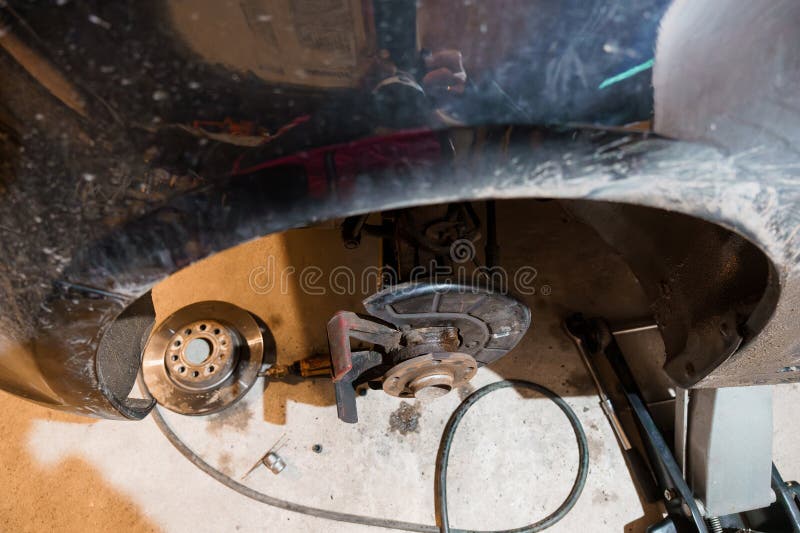 Car Brake System Disassembly in Garage Environment Stock Image - Image ...