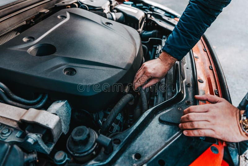 Car Breakdown Inspection., Checking Car Engine in Trunk Stock Photo ...