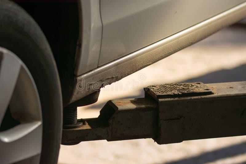 Car on a Car Lift Under Repair Stock Image - Image of repair, brake ...