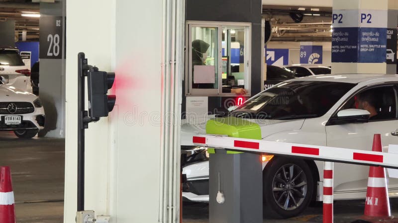 A Car Carefully Navigating through a Parking Area that is Marked with ...