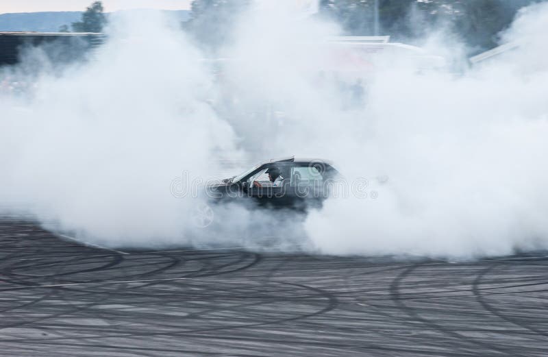 Car in Clouds of Smoke after Doing a Burnout.. Editorial Photo - Image ...