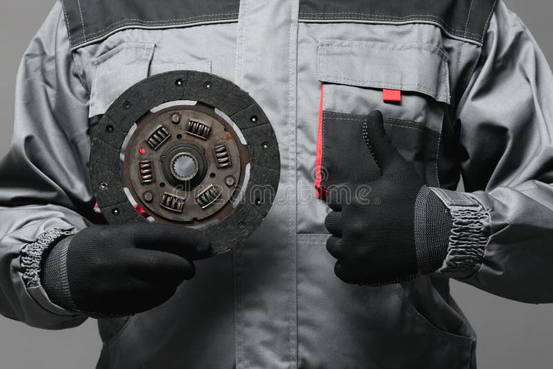 A car clutch disc stock photo. Image of hand, showing - 210620032