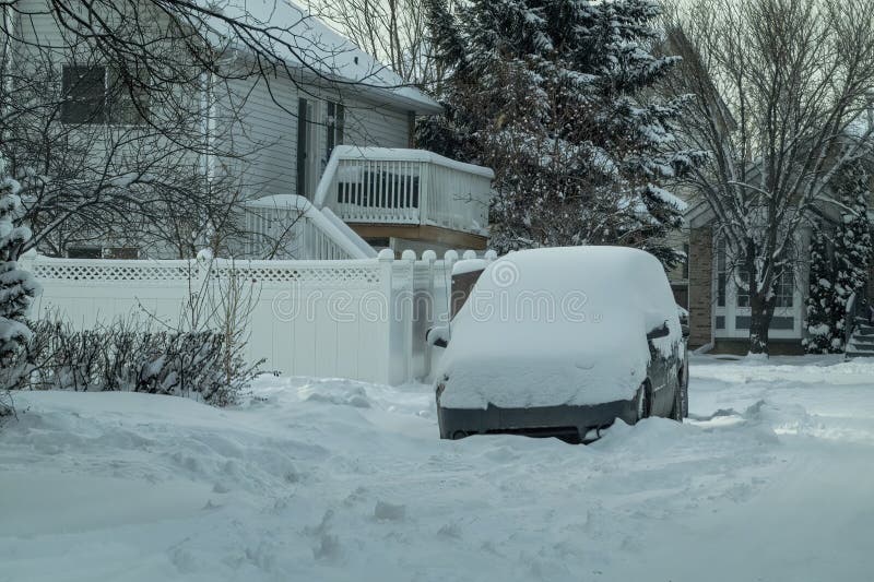 A Car Cover by Snow after a Heavy Blizzard Snow Storm Stock Photo ...