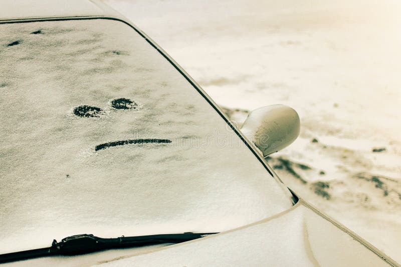 The Car Covered with Snow with a Evil Face on the Glass. Winter ...