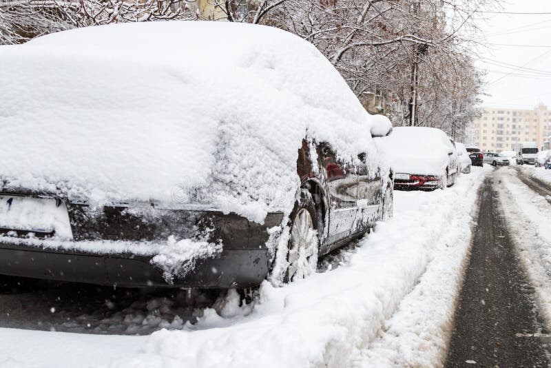 Car Covered with Snow in the Parking after a Storm Stock Image - Image ...