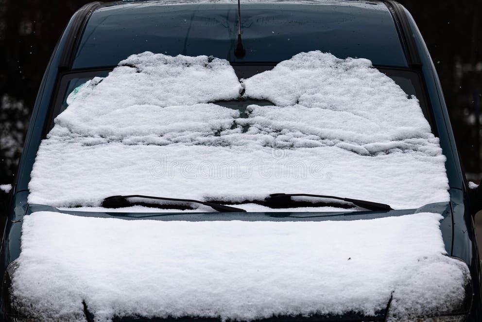 Car Covered in a Thick Layer of Snow with Its Windshield Stock Photo ...