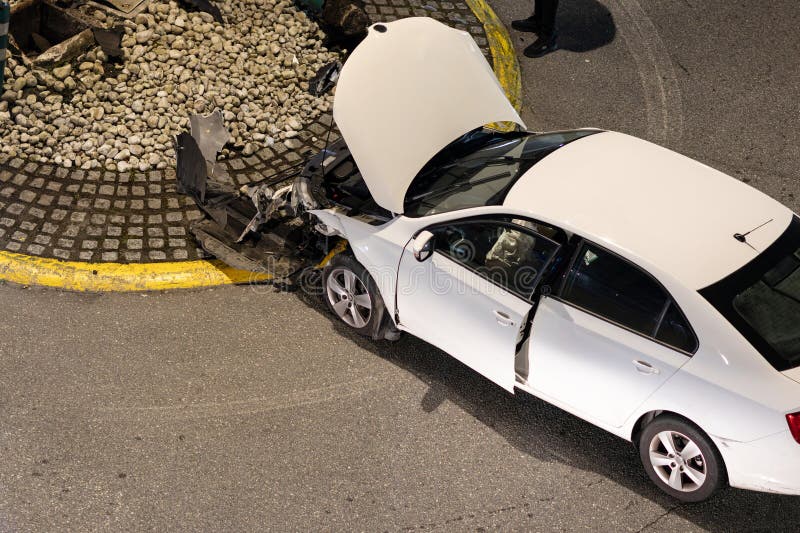 Car Crash Scene at a City Traffic Circle at Night Stock Image - Image ...