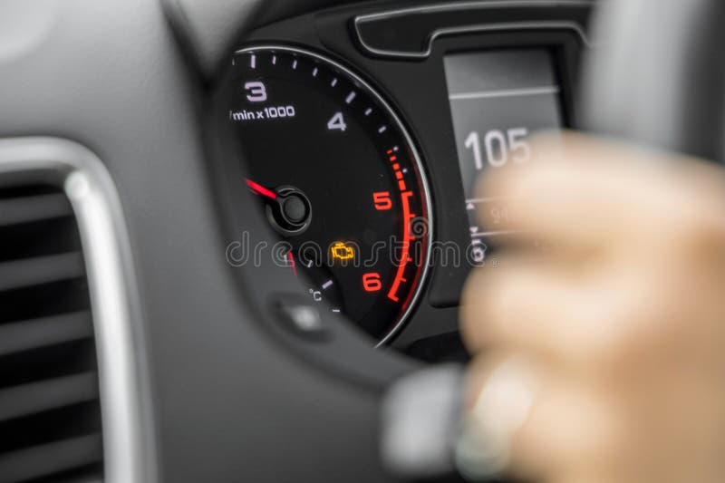 Car Dashboard with Amber Engine Light on Stock Photo - Image of symbol ...