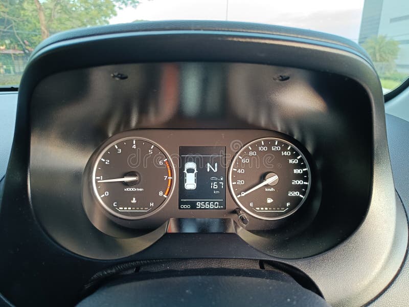 Car Dashboard Close-Up Showing Speedometer and Tachometer Displays ...