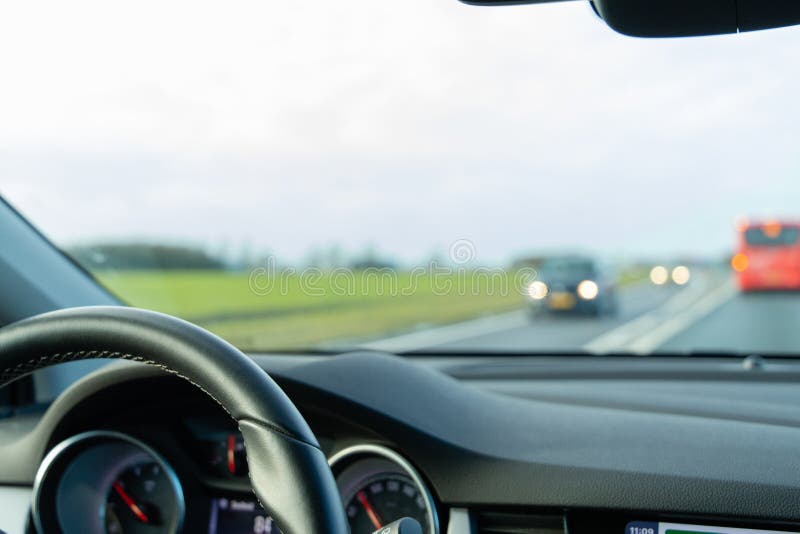Car Dashboard while Driving on the Highway Stock Photo - Image of blur ...