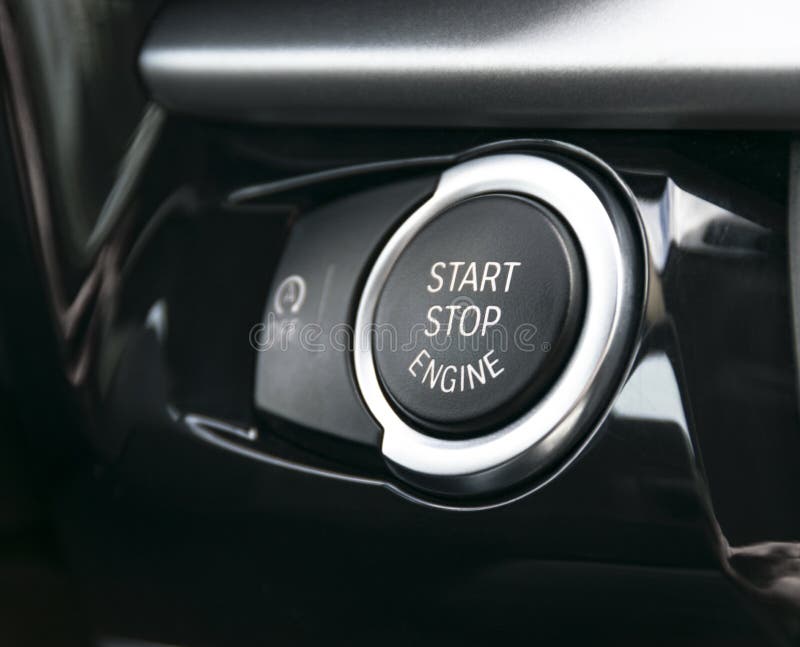 Car Dashboard with Focus on Engine Start Stop Button. Modern Car ...