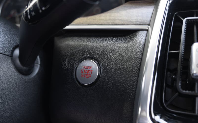 Car Dashboard with Focus on Engine Start Stop Button. Modern Car ...