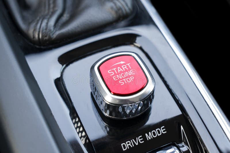 Car Dashboard with Focus on Red Engine Start Stop Button. Modern Car ...