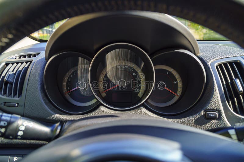 Car Dashboard through the Steering Wheel Frame Stock Photo - Image of ...