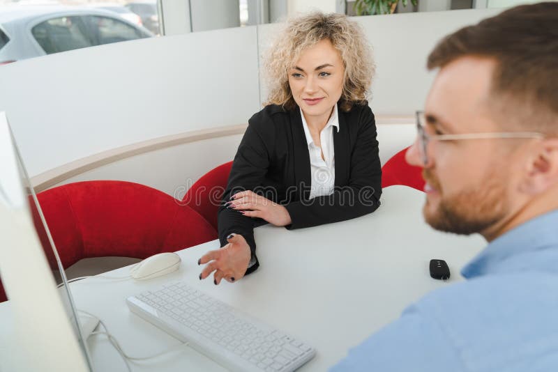 Car Dealership Manager and Client at the Computer. Stock Photo - Image ...