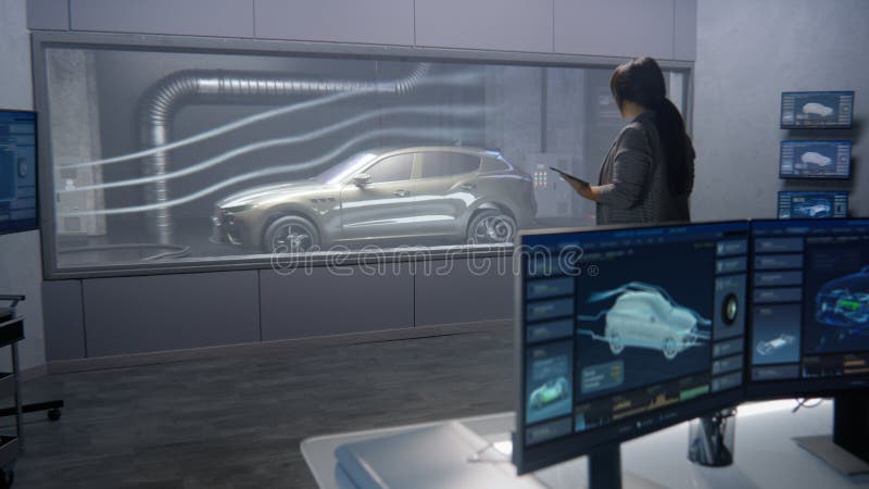Engineers Testing the Aerodynamic Properties of a Car in a Laboratory ...