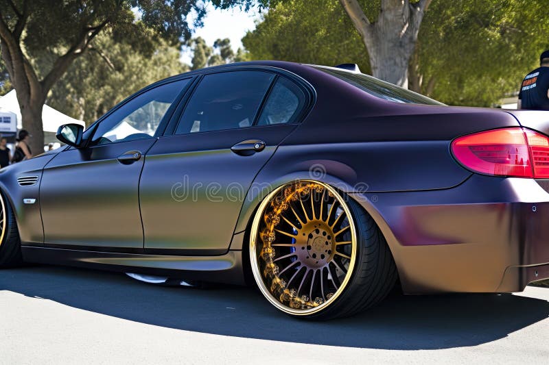 Car with Designer Rims, Spoiler, and Oversized Wheels Stock ...