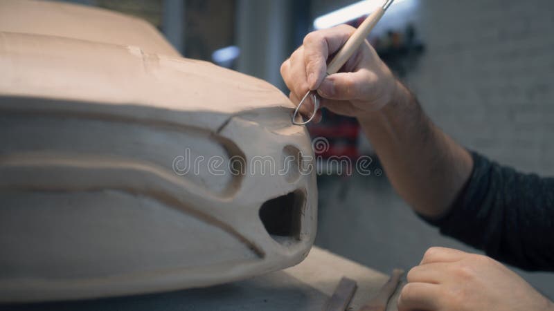 Car Designer Works on Prototype Car Using Loop Tools To Create Details ...