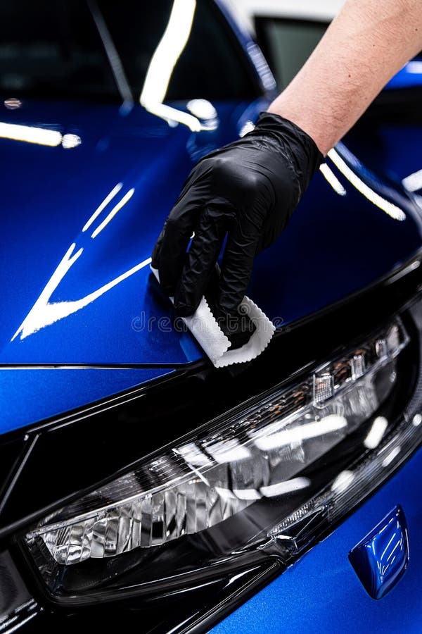 Car Detailing Studio or Car Wash Worker Applying Ceramic Car Coating on ...