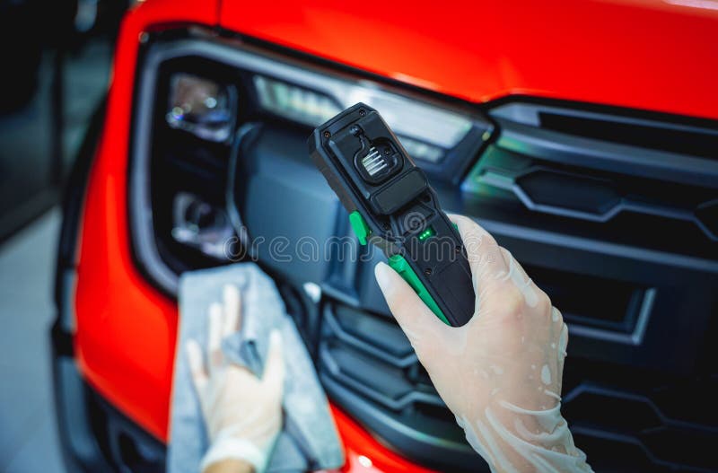 Car Detailing Worker Cleaning and Polishing Car with Microfiber Cloth ...