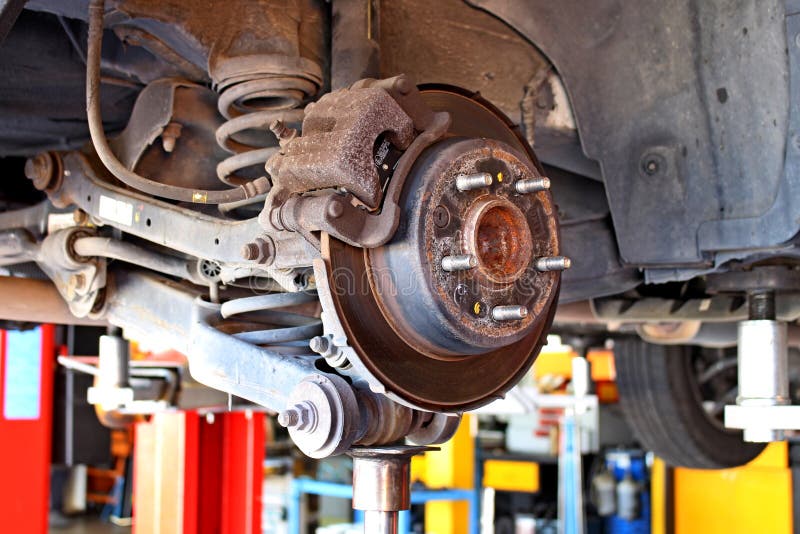 Car Disc Brakes and Visible Shock Absorbers without Wheel Stock Photo ...