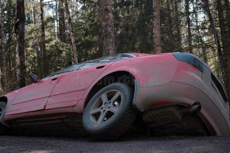 Car in a ditch stock image. Image of risk, vehicle, collision - 220447595