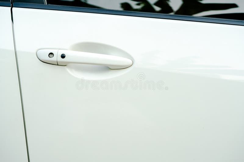 Car Door Handle on Driver S Door of Modern White Car Stock Photo ...