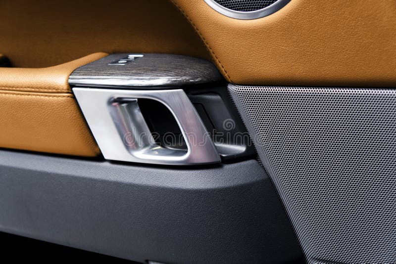 Car Door Handle Inside the Luxury Modern Car with Brown Leather Texture ...