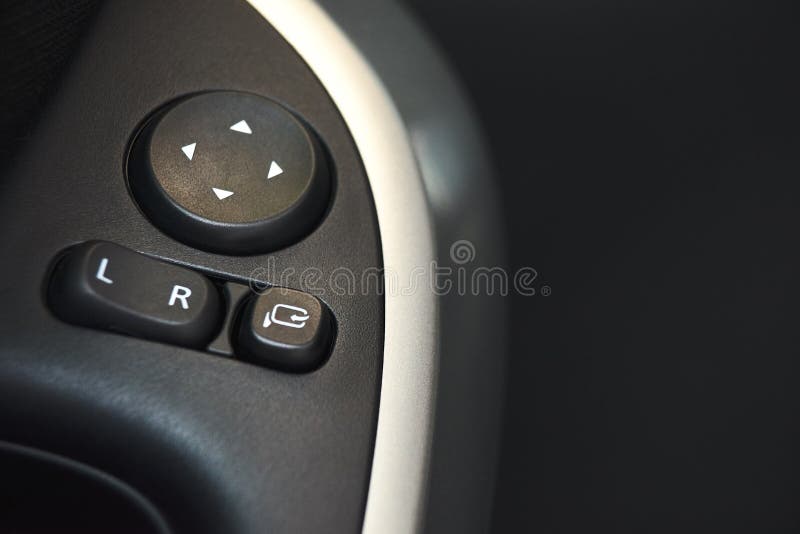 Car Door Lock, Window Button And Side Mirror Adjuster Button On A Car ...