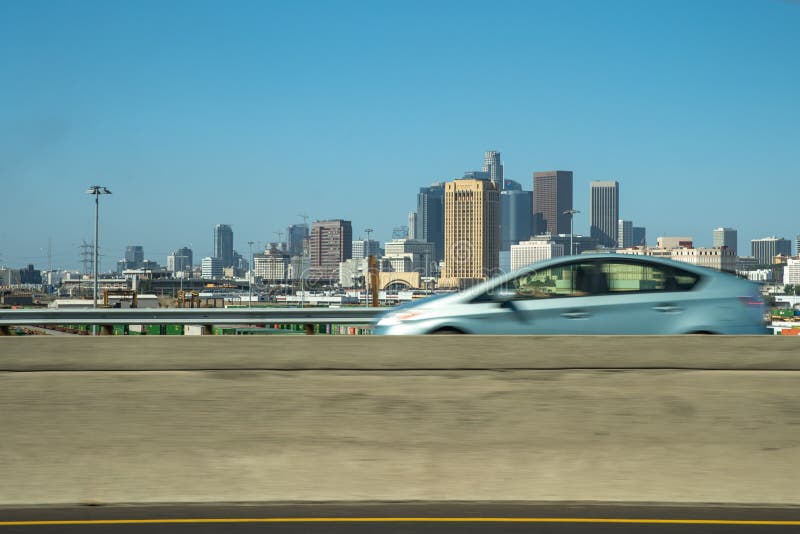Car Drive through a Bridge with a View of Downtown Los Angeles ...