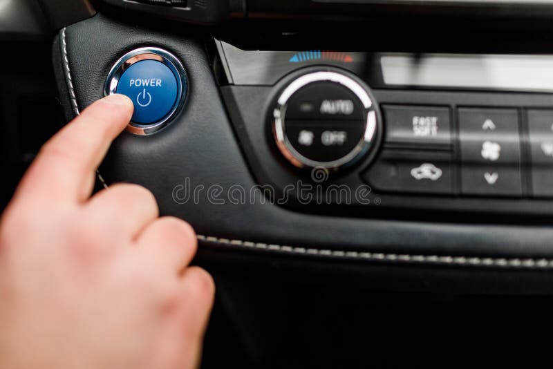 Driver Pushing Car Engine Start-stop Button in Modern Car. Stock Image ...