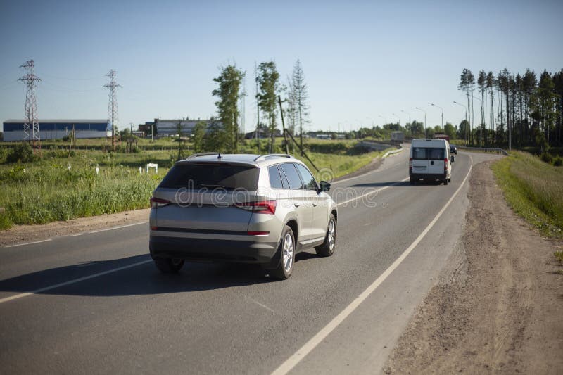 A Car Drives on the Road in Summer. a Car on a Road Stock Image - Image ...