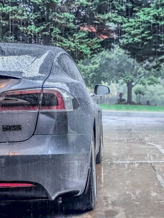 Car in Driveway with Heavy Rain Pouring Down Stock Image - Image of ...