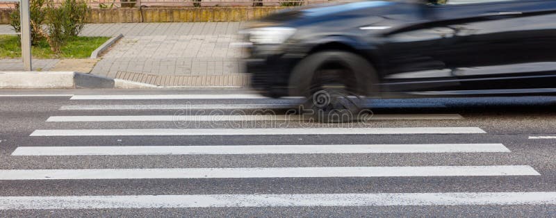 A Car is Driving Across a Crosswalk Stock Image - Image of line ...