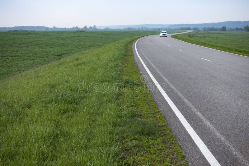 Car Driving on the Asphalt Road Rural Landscape Stock Image - Image of ...