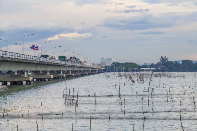 Car Driving on Bridge with Traditional Fishing in Lake Stock Photo ...