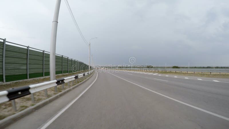 The Car is Driving Exit from Highway. Rear View. Stock Footage - Video ...