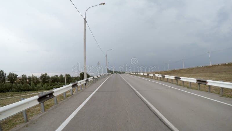 The Car is Driving Exit from Highway. Rear View. Stock Footage - Video ...