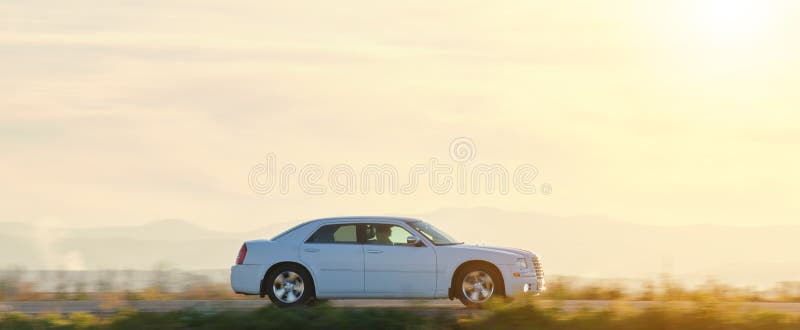 Car Driving Fast on Intercity Road at Sunset. Highway Traffic in ...
