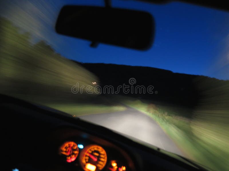 Car driving fast at night stock image. Image of indicator - 29196225